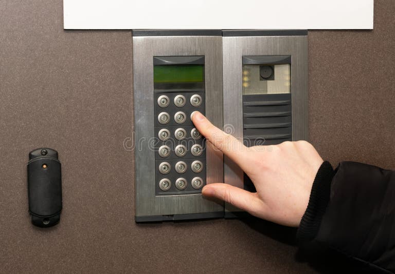 Hands Pressing on Intercom stock image. Image of access - 247689791
