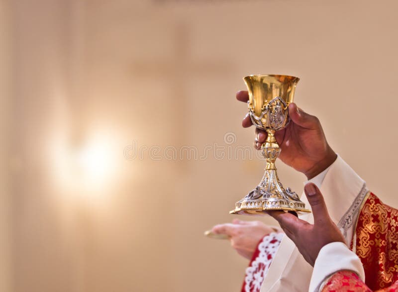 Hands of the Priest Raise the Blood of Christ Stock Image - Image of ...