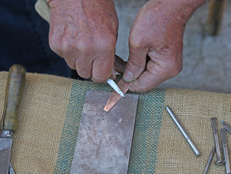 Hands during the Processing of a Copper Tool Stock Image - Image of ...