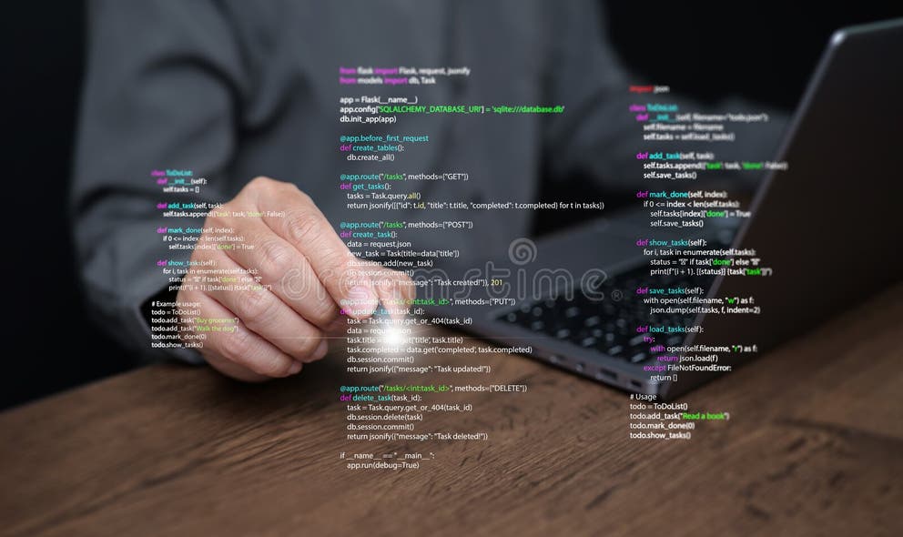 Hands of a Programmer Types on a Laptop Displaying Programming Code, Symbolizing Coding Tech ...