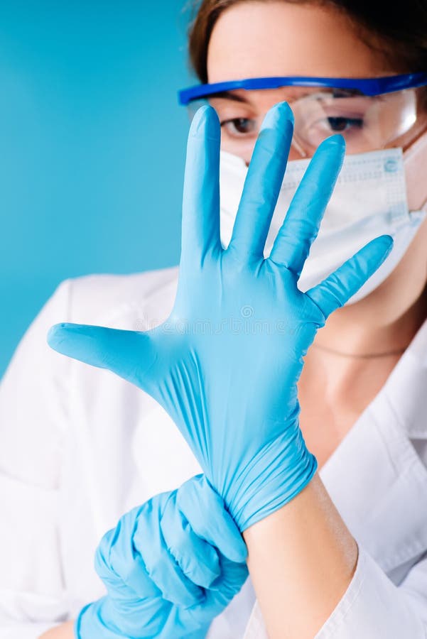 Hands In Protective Gloves Girl Medical Worker Dresses Blue Rubber