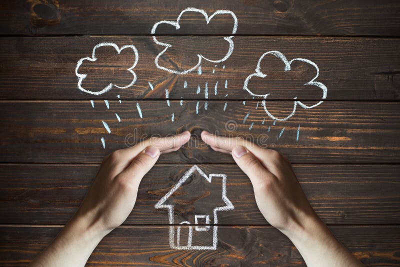 Hands Protects a House from the Elements - Rain or Storm Stock Photo ...