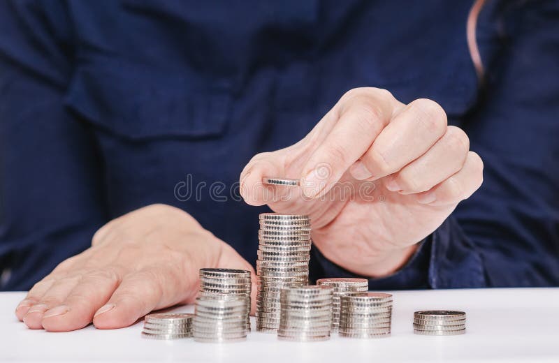 Hands Put a Coin on Big Stack, Dark Clothes Stock Photo - Image of ...