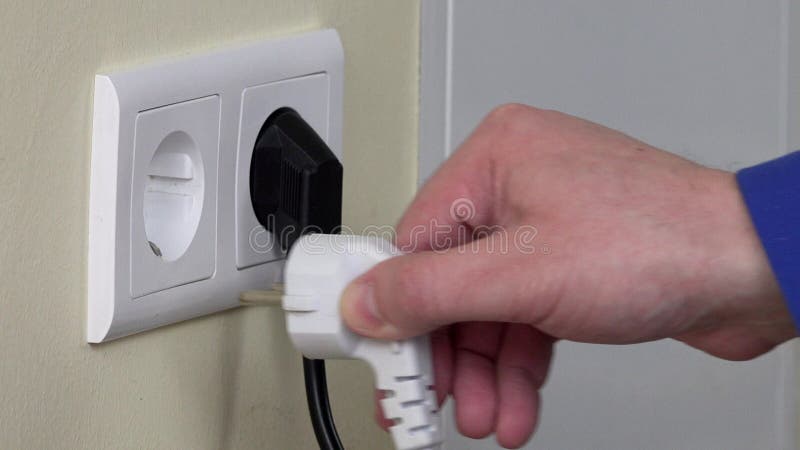 Hands Put Plug into Electricity Socket Stock Video - Video of ...