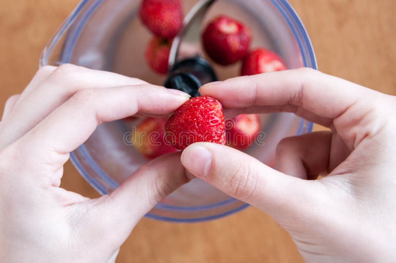 Hands Put a Strawberry in a Blender, Top View Stock Image - Image of ...