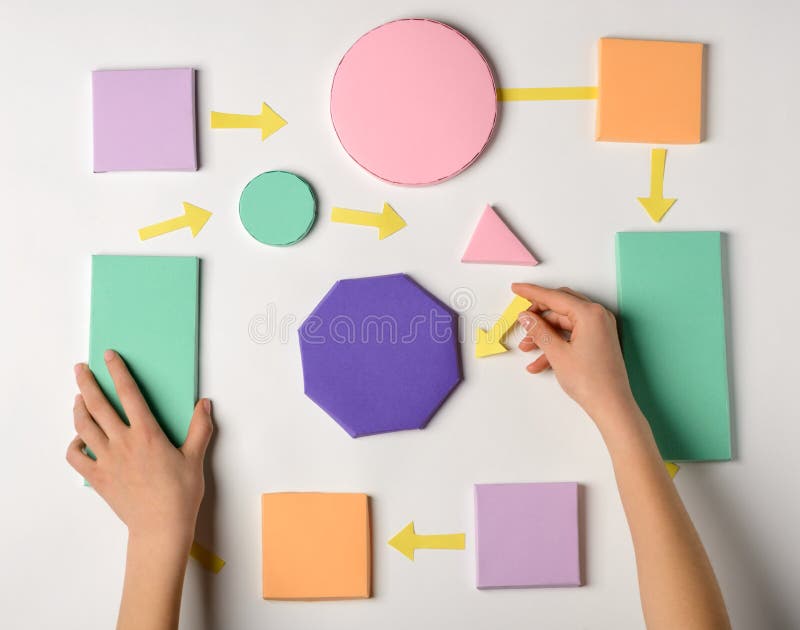 Hands Putting Paper Figures Stock Image - Image of background ...