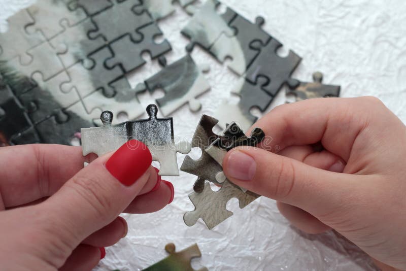 In the Hands of Puzzles. Board Game Stock Image - Image of finger ...