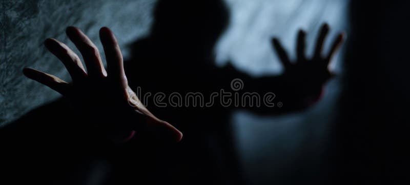 The Hands Reaching Out from the Shadows in a Dark Environment AI ...