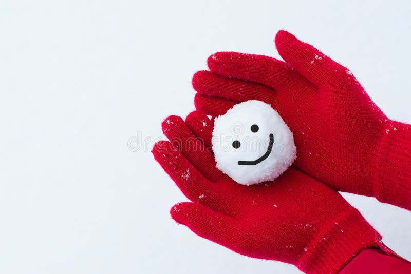 Hands in Red Gloves Holding Smiling Snowball Stock Image - Image of ...