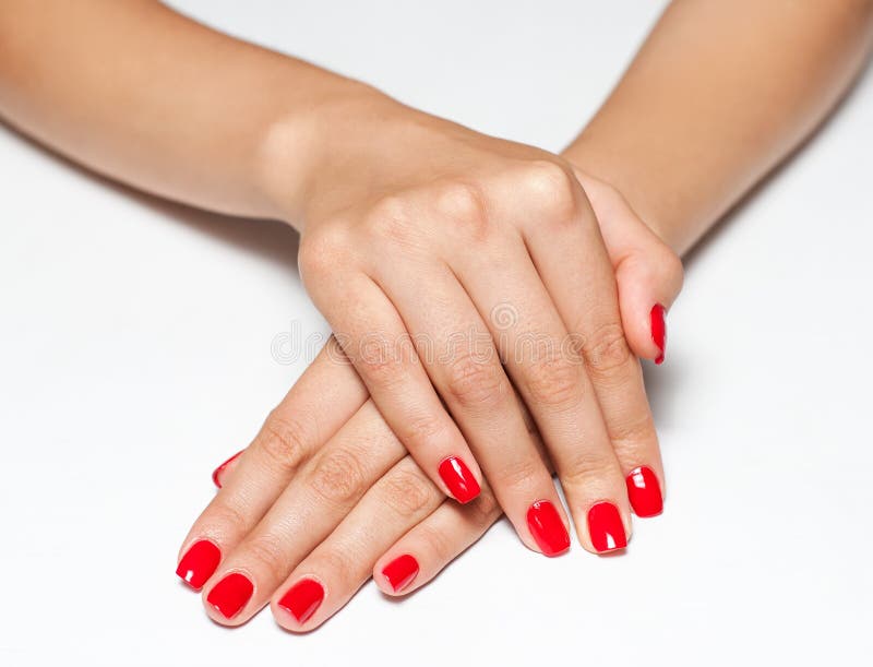 Hands with red manicure stock image. Image of beauty - 27834933