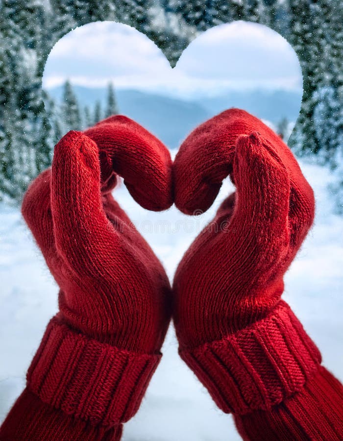 Hands in Red Mittens Forming a Heart Shape in the Snow Stock ...