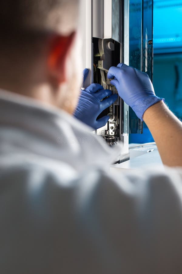 Hands of a Researcher Carrying Out Scientific Research Stock Photo ...