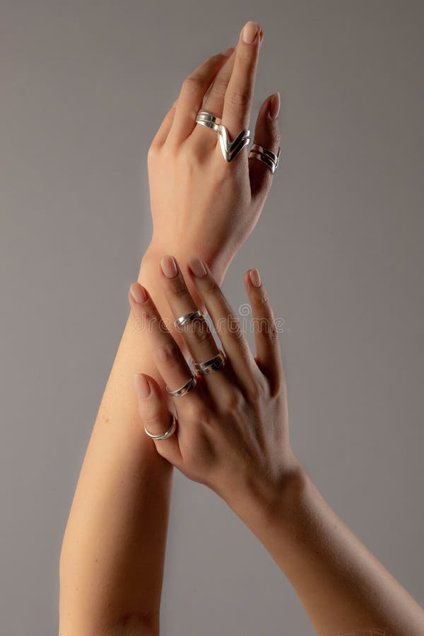 Hands with rings stock photo. Image of jewelry, nails - 219852728