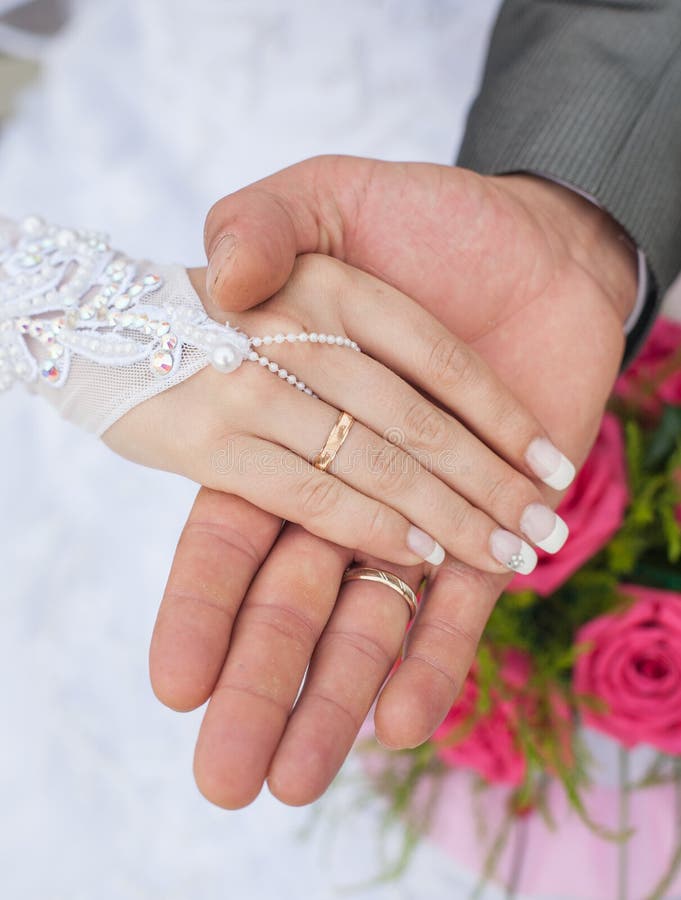 Hands and Rings it is Wedding Bouquet Stock Photo - Image of happiness ...