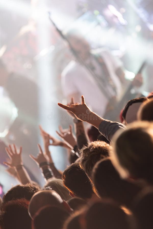 Hands on the rock concert stock image. Image of dance - 143120629