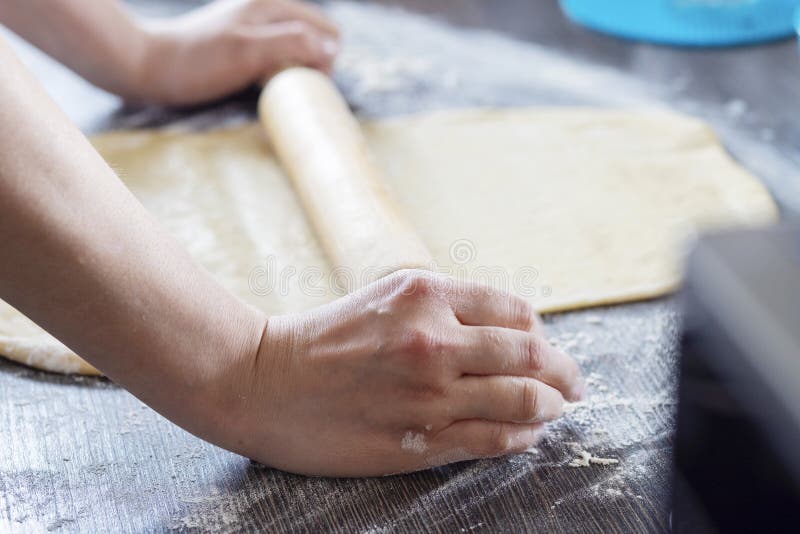 Hands, Rolling-pin and Dough for Bread, Pasta or Pizza on Wooden Table ...