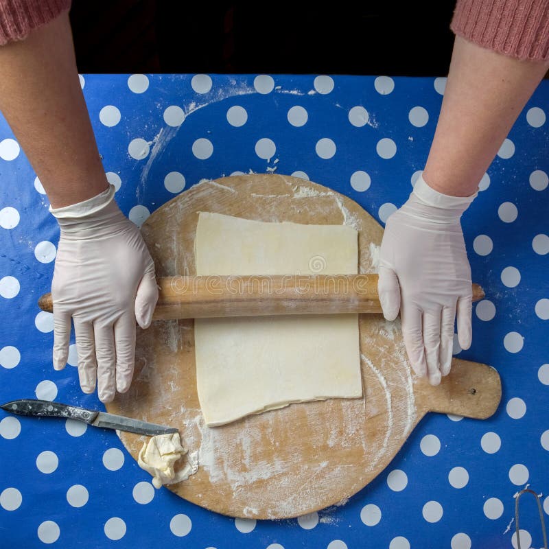 Hands are Rolling a Rolling Pin To Roll Dough Stock Photo - Image of ... Hands are Rolling a Rolling Pin To Roll Dough Stock Photo - Image of ...