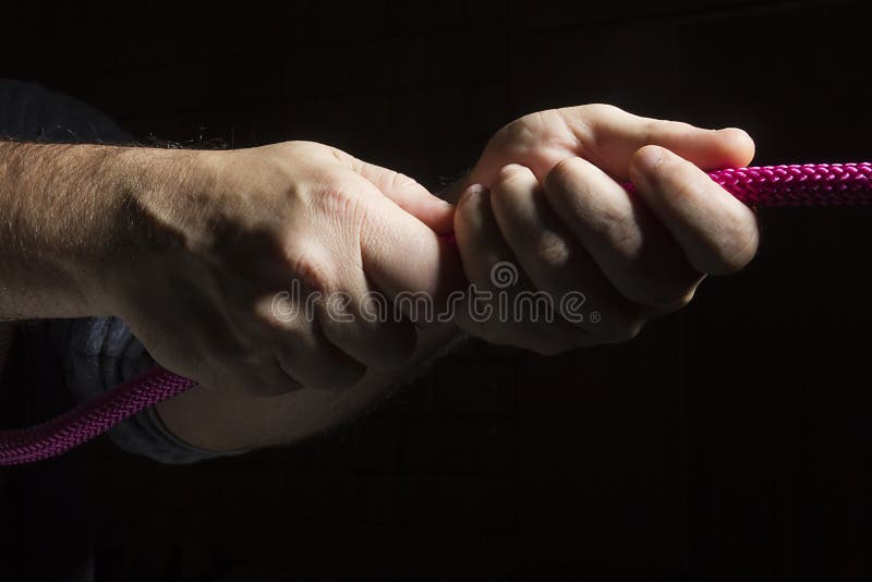 Hands with a rope stock photo. Image of park, power - 174509216