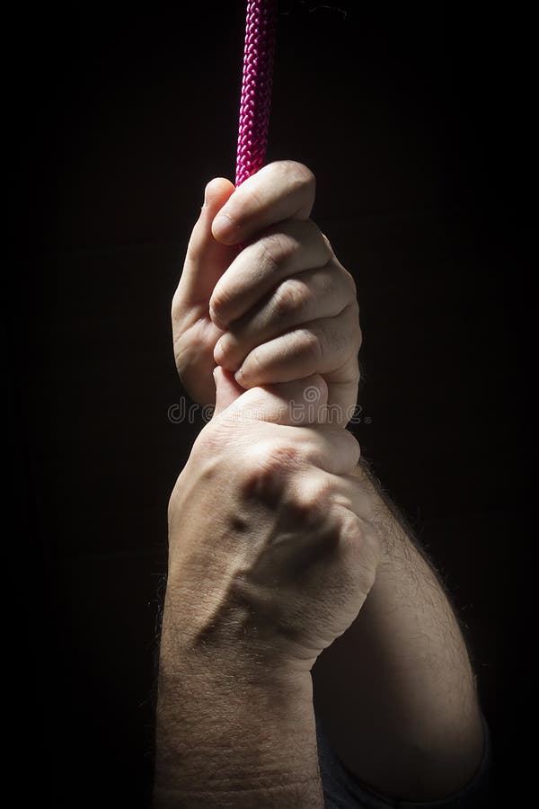 Hands with a rope stock photo. Image of struggling, grasping - 173190010