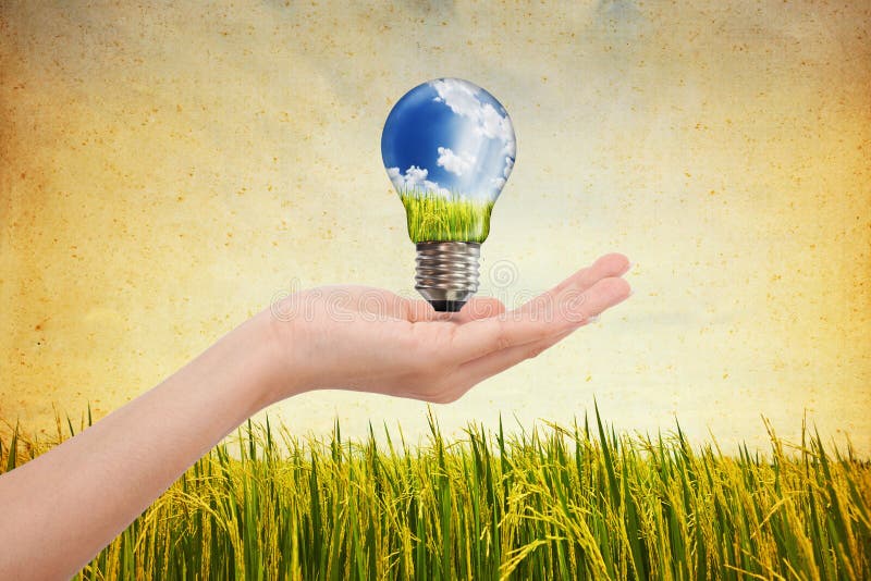 Hands saving Green Energy stock photo. Image of light - 19658044