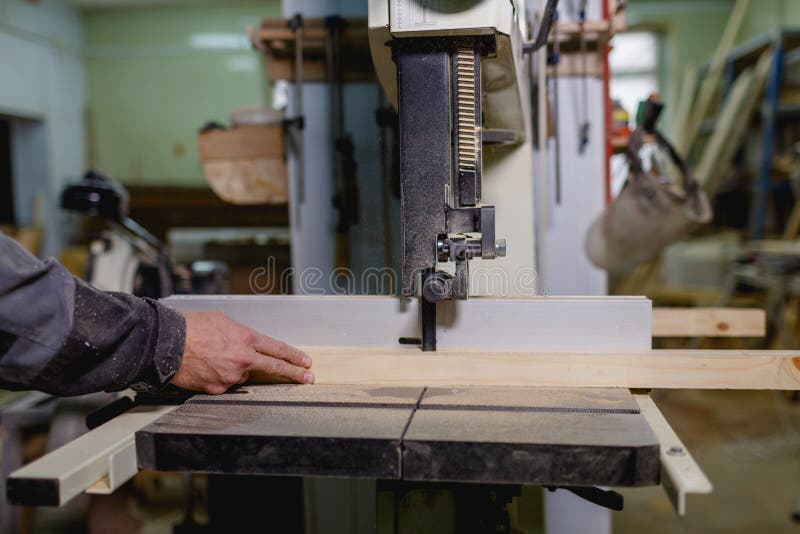 Hands Saw a Bar on a Jigsaw Machine. Side View Close-up Stock Photo ...