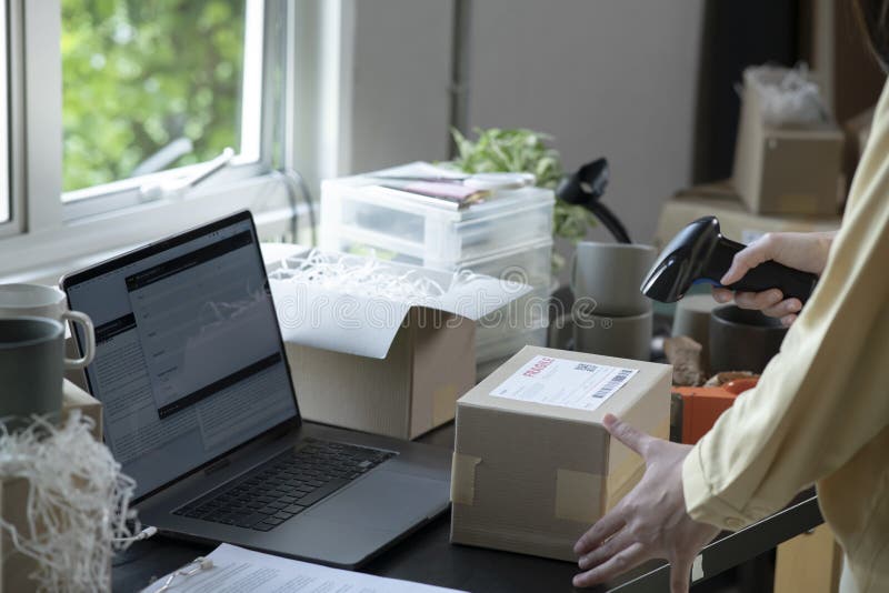 Hands by Scanning a Tube Barcode Label for Tracking Blood Sample Stock ...