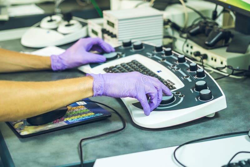 Hands of a Scientist on a Ontrol Panel of an Electron Microscope Stock ...