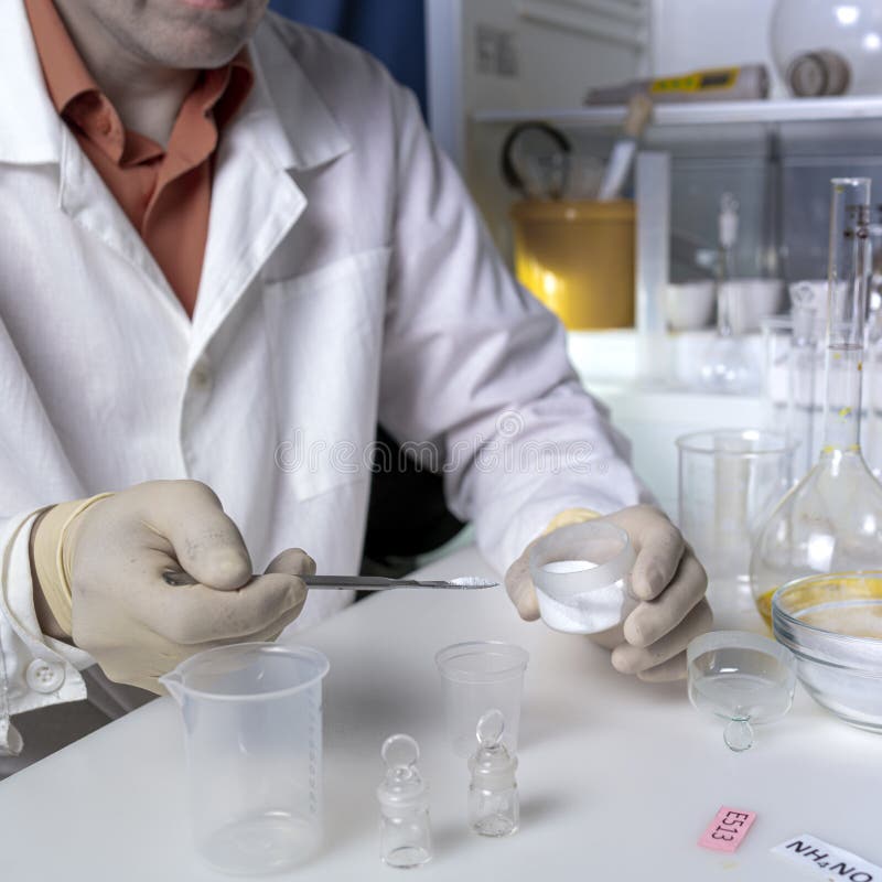 The Hands of a Scientist Working with Laboratory Samples of Nutritional ...