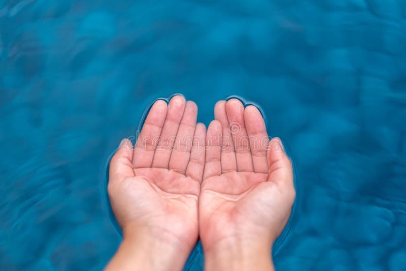 Hands scooping clear water stock image. Image of hold - 158810267