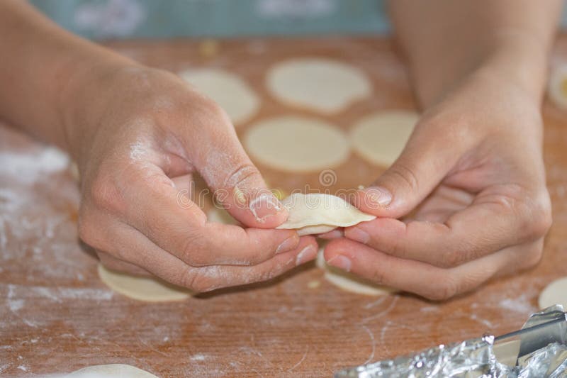 Hands Sculpt Dumplings, Food from Dough and Potatoes Stock Image ...