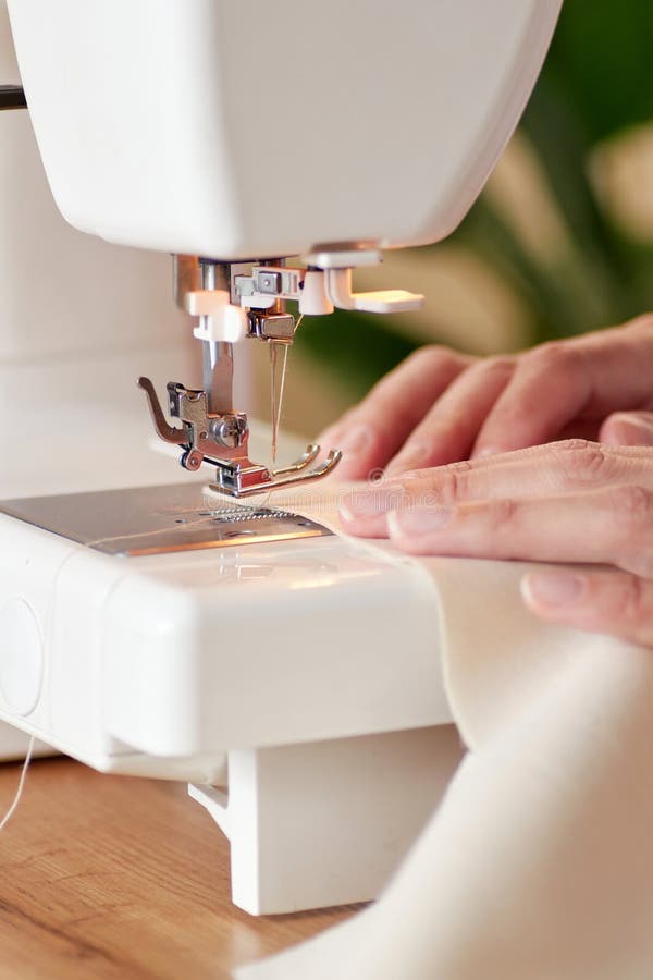 Hands of Seamstress Working on Sewing Machine Stock Image - Image of ...