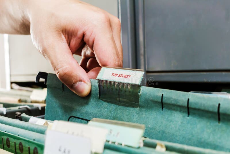 Hands Searching through File Folders Stock Photo - Image of group ...