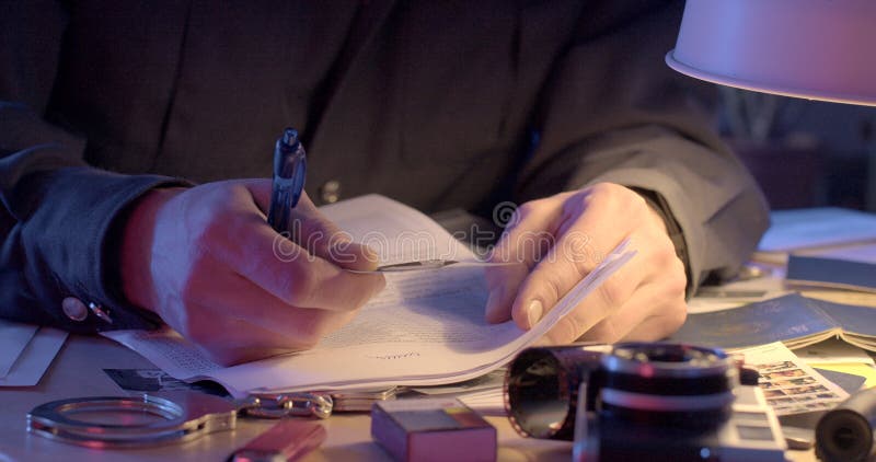 The Hands of the Secret Police are Examining Documents Accumulating ...