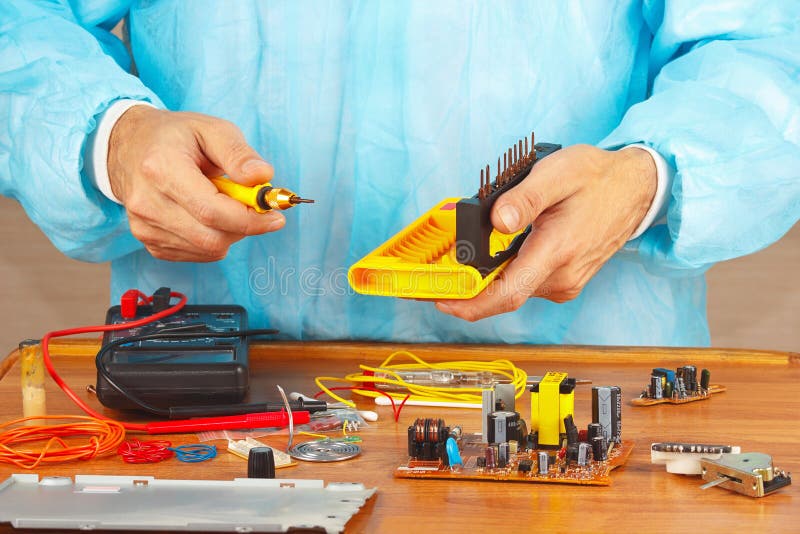 Hands Service Engineer of Electronic Equipment in Service Workshop ...