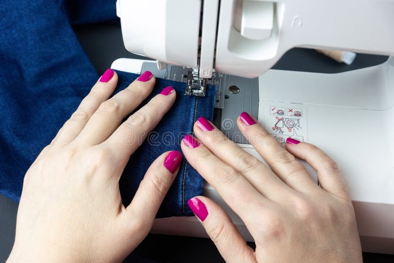 Hands on the Sewing Machine Stock Photo - Image of detail, fabric ...