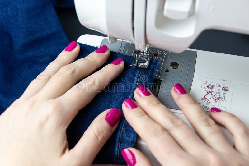 Hands on the Sewing Machine Stock Photo - Image of close, hobby: 165997076