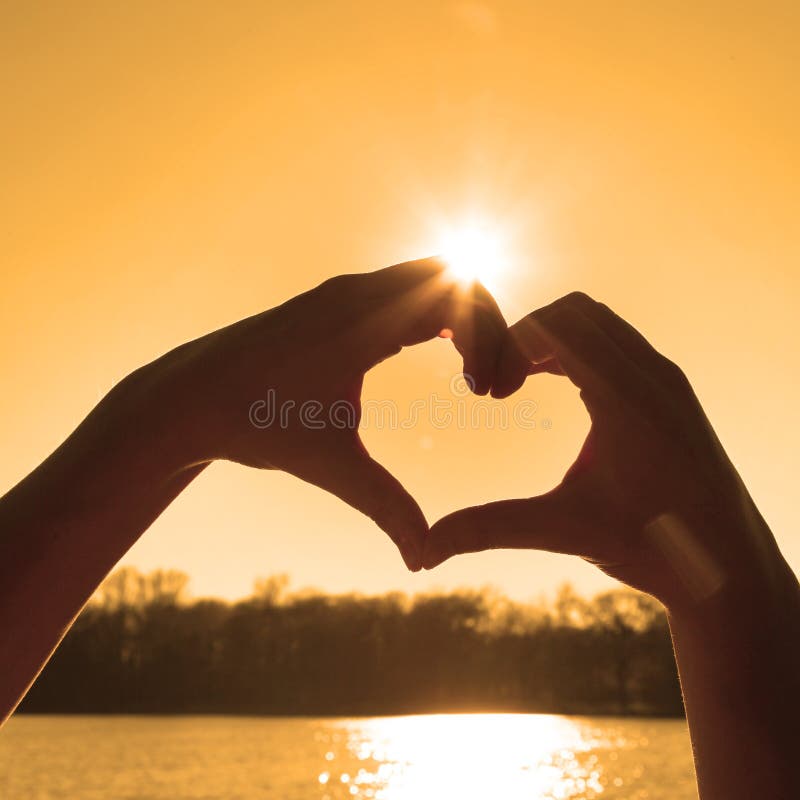 Hand Shaped Heart Against Sunset Stock Image - Image of freedom ...