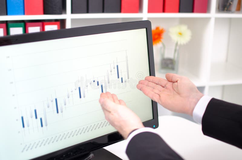 Hands Showing a Screen with Stock Exchange Data Graph Stock Image ...