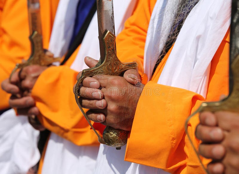 Hands of a Sikh Senior Man Who Hold the Sword during Religious F Stock ...