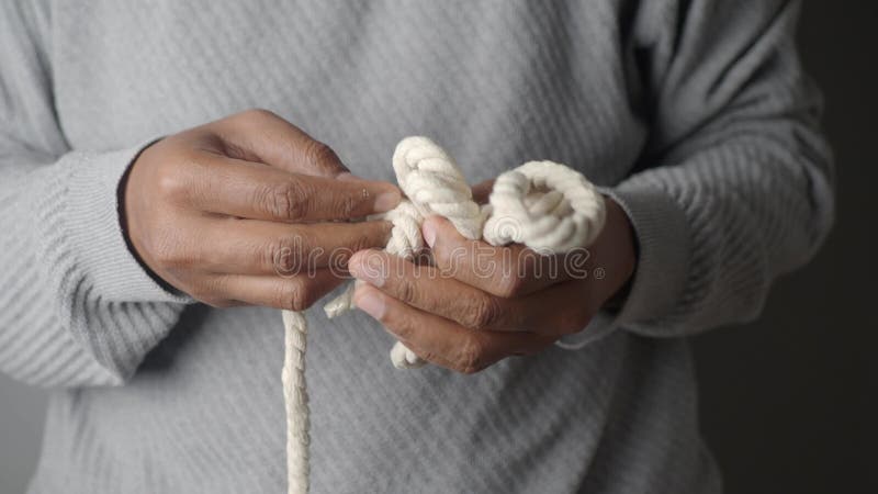 Demonstrating Various Rope Techniques for Practical Use Stock Footage ...
