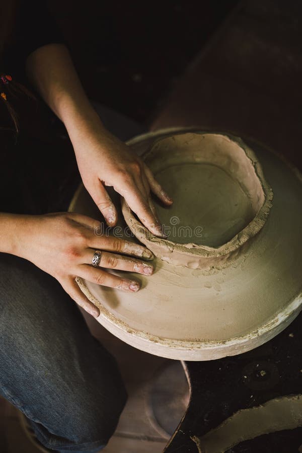 Hands Skillfully Shape a Clay Pot in a Pottery Studio Stock Photo ...