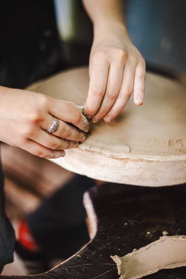 Hands Skillfully Shape a Clay Pot in a Pottery Studio Stock Image ...