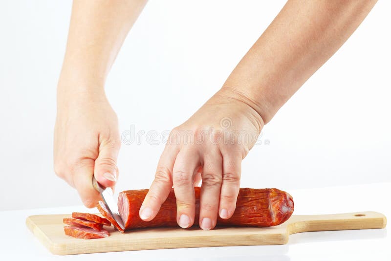Hands Sliced Salami on a Cutting Board Stock Photo - Image of cook ...