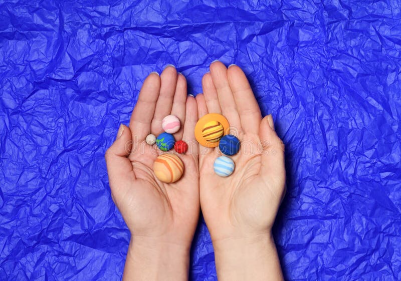 Hands with Small Solar System Planets Stock Image - Image of collection ...