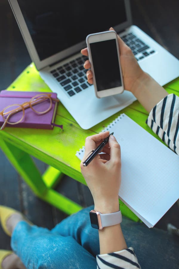 Hands with Smartphone Over Laptop and Paper Notes Stock Image - Image ...