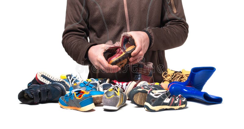 Hands are Sorting Out Shoes and Clothes from Second Hand Stock Image ... Hands are Sorting Out Shoes and Clothes from Second Hand Stock Image ...