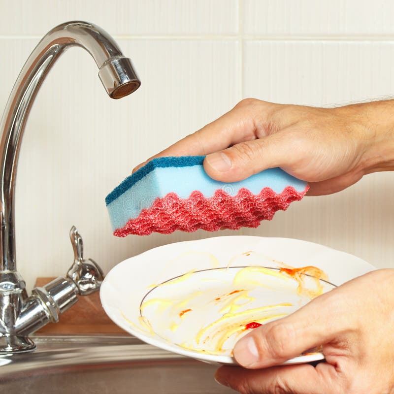 Hands with Sponge and Dirty Plate Over the Sink in Kitchen Stock Photo ...