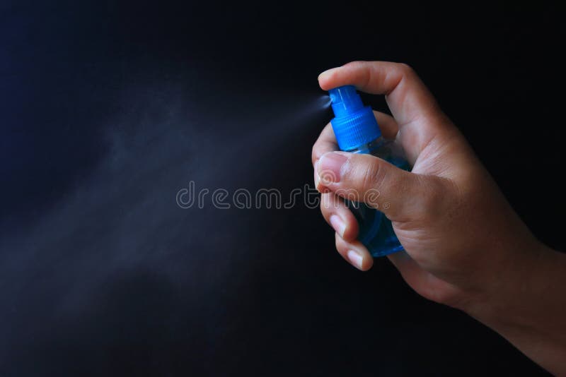 Hands are Spraying Alcohol for the Safety from Germs and the Virus ...