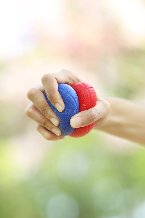 Hands Squeezing a Stress Balls Stock Photo - Image of male, nervous ...