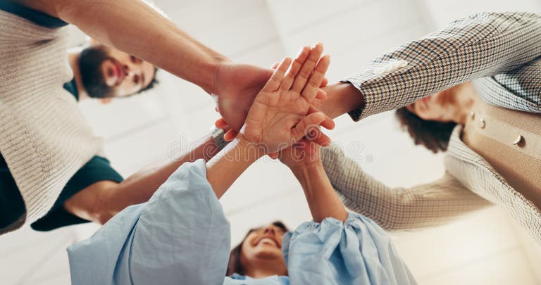 Hands, Stack and Team at Office with Low Angle, Support or Synergy with ...